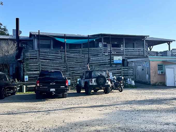 The weathered wood and waterfront views create the perfect backdrop for fresh Lowcountry seafood feasting.