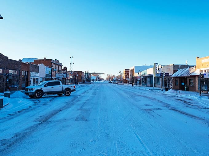 Fresh snow blankets Main Street in a town where winter heating bills won't freeze your bank account solid.