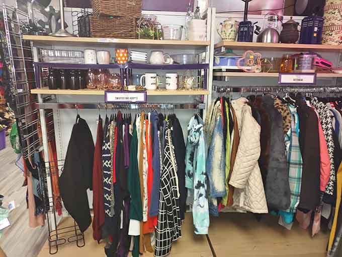 Inside, clothing racks burst with color like a rainbow exploded in the best possible way for shoppers.