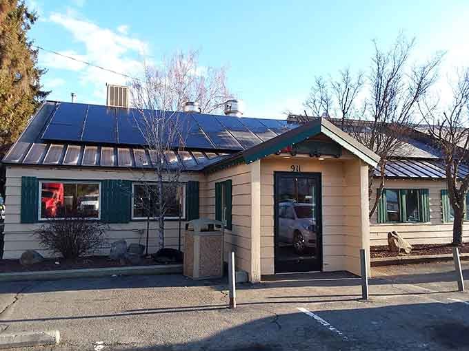 The cozy architecture and welcoming entrance promise mountain-town hospitality with every fluffy pancake and crispy bacon strip.