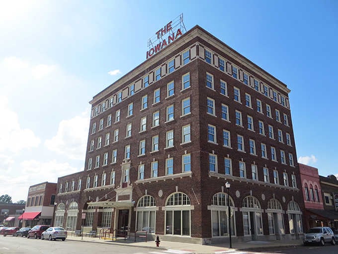 The iconic Iowana Hotel stands tall in Creston's skyline, a brick sentinel watching over generations of small-town memories.