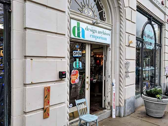 The charming storefront entrance welcomes shoppers with eclectic finds visible through glass doors and windows.