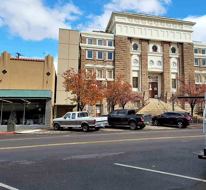Classic courthouse architecture standing tall with autumn colors, the kind of civic pride that built America one town.