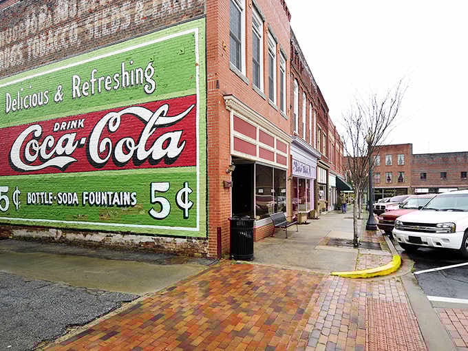 That vintage Coca-Cola mural takes you back to when a nickel bought happiness and nobody complained about it.