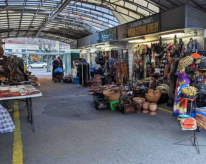 Covered stalls overflow with colorful textiles, handcrafted items, and cultural treasures from near and far.