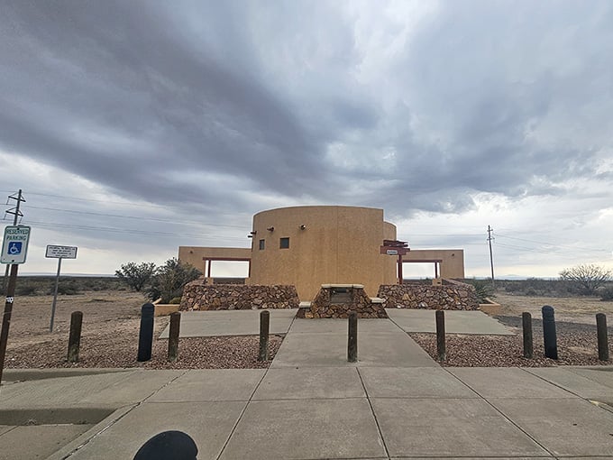 Storm clouds gather above the desert observation area, adding atmospheric drama to this legendary unexplained phenomenon site.