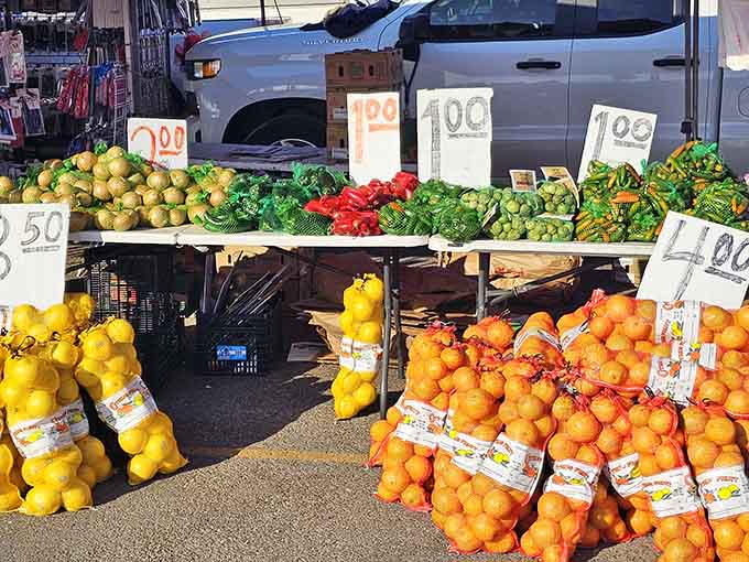 Fresh citrus pyramids glow like edible sunshine, reminding us that healthy eating starts at the local market.