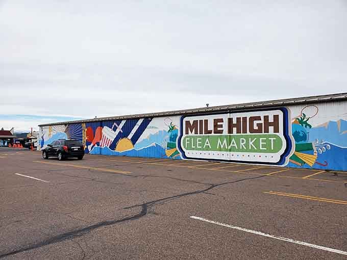The iconic Mile High sign stands proud against blue sky, marking a legendary destination for bargain hunters.