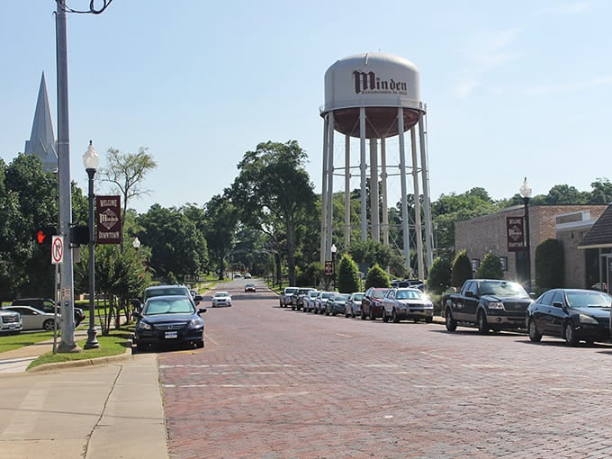 That iconic water tower watches over Minden's brick-paved streets like a friendly guardian, announcing you've arrived somewhere special and affordable.