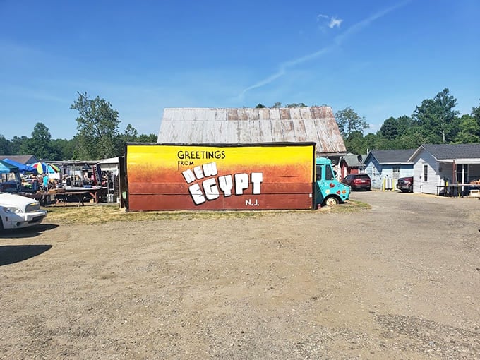 That vintage postcard mural welcomes visitors with old-school charm that would make even Norman Rockwell smile with approval.