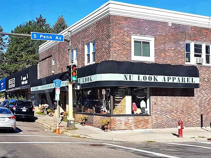 The classic brick storefront of Nu Look houses fashion treasures waiting to be discovered. Vintage vibes with modern appeal.