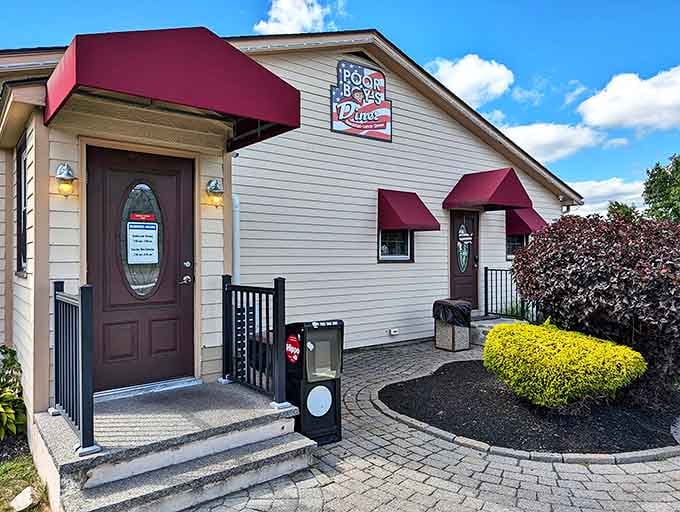 With its neat landscaping and welcoming entrance, Poor Boy's looks like the kind of place where the waitress might call you "hon" and actually mean it.