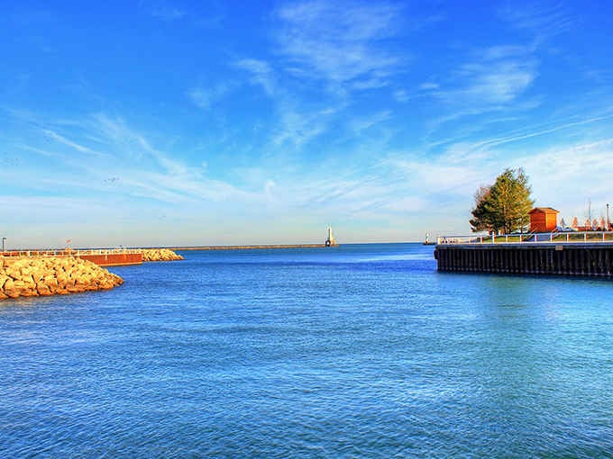 Lake Michigan stretches endless and blue, proving Mother Nature's the best interior designer when it comes to waterfront views.