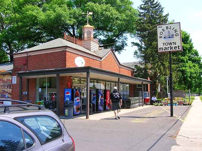 The Roebling Town Market sign beckons locals for essentials in a building that's served the neighborhood for generations past.