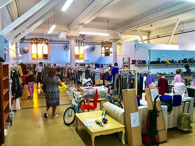 The soaring ceilings and colorful displays create a treasure hunt atmosphere where even that bicycle looks like it's shopping.
