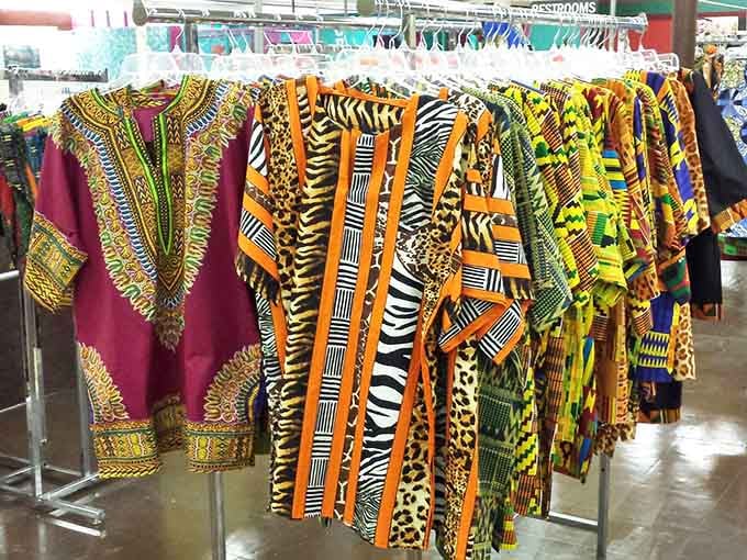 Bold African-print dashikis hanging in geometric glory bring global style to local bargain hunting with spectacular flair.