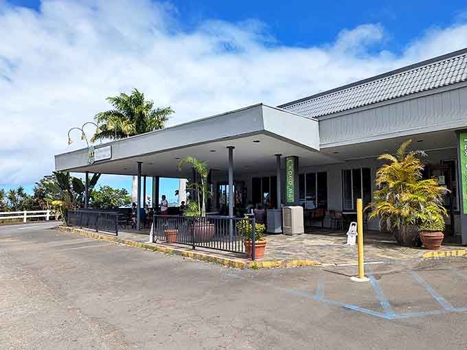 Under this covered lanai, visitors and locals alike bond over the universal language of perfectly fried malasadas and gravy-smothered everything.