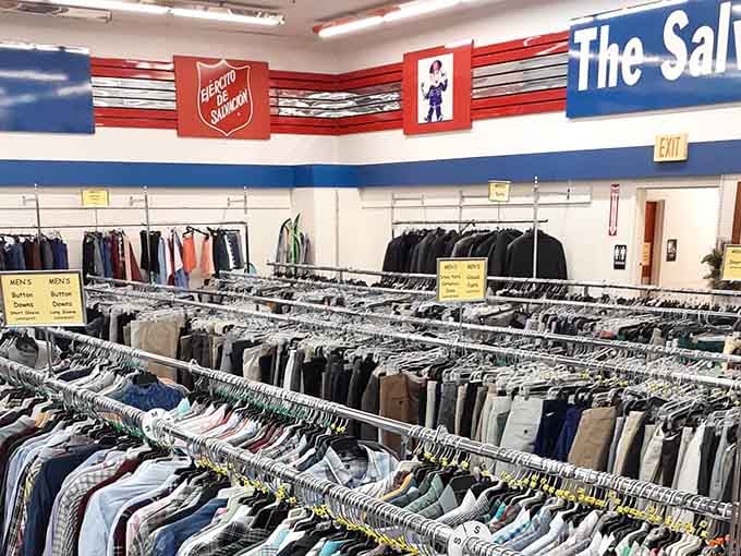 Inside, organized racks stretch as far as the eye can see. A sea of possibilities at Salvation Army prices!
