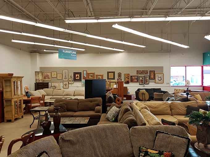 Inside, comfortable furniture displays stretch across the spacious showroom like a living room showroom at a fraction of retail cost.