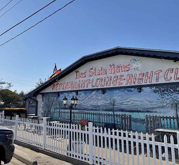 That hand-painted Alpine mural and white picket fence transport diners straight to Bavaria without ever leaving Missouri's capital city limits.