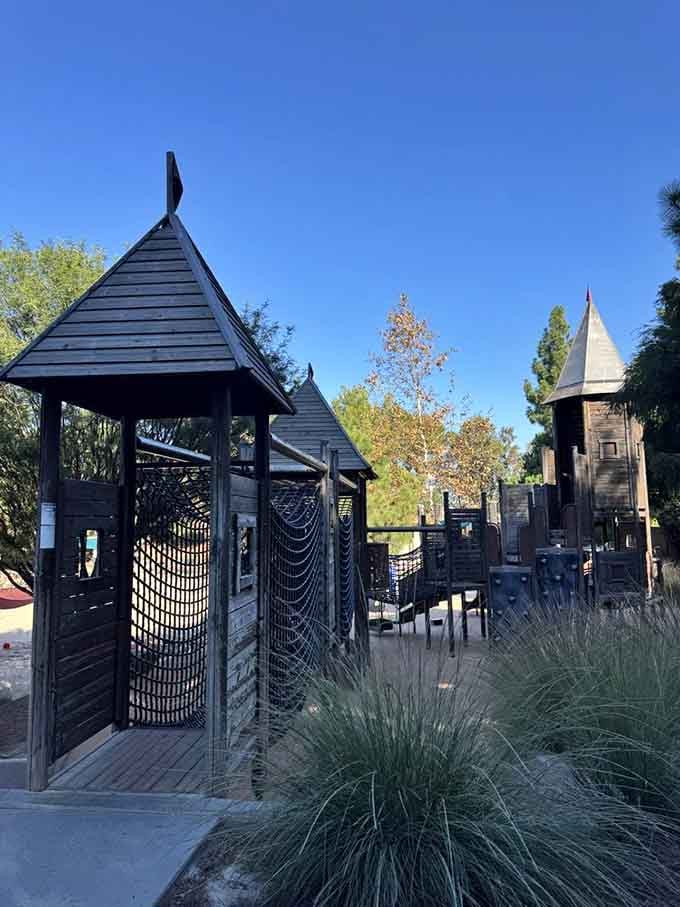 These wooden structures look like they were designed by kids who actually know what fun means, not cautious adults.