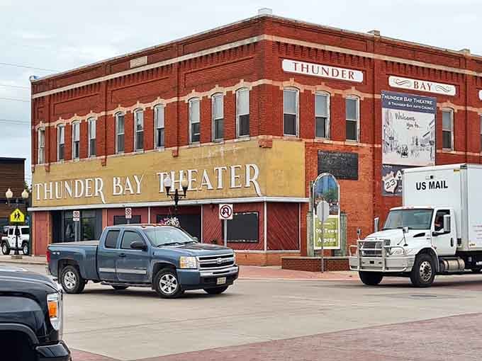 The Thunder Bay Theatre building's vintage brick facade tells stories of entertainment spanning generations, not just streaming seasons.