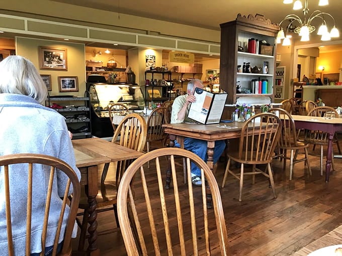 Multiple dining rooms mean there's always a cozy corner waiting, complete with that "nothing brings people together" philosophy overhead.