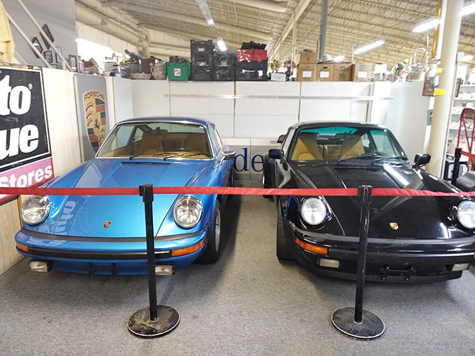Classic Porsches casually parked indoors because apparently some antiques need their own garage space too.