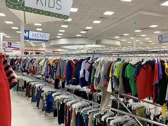Kids' clothing organized by size because children grow faster than weeds, and your budget knows it.