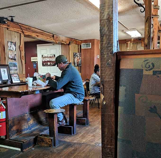 Real people enjoying real food in a real restaurant, no Instagram filters or fancy plating required here, folks.