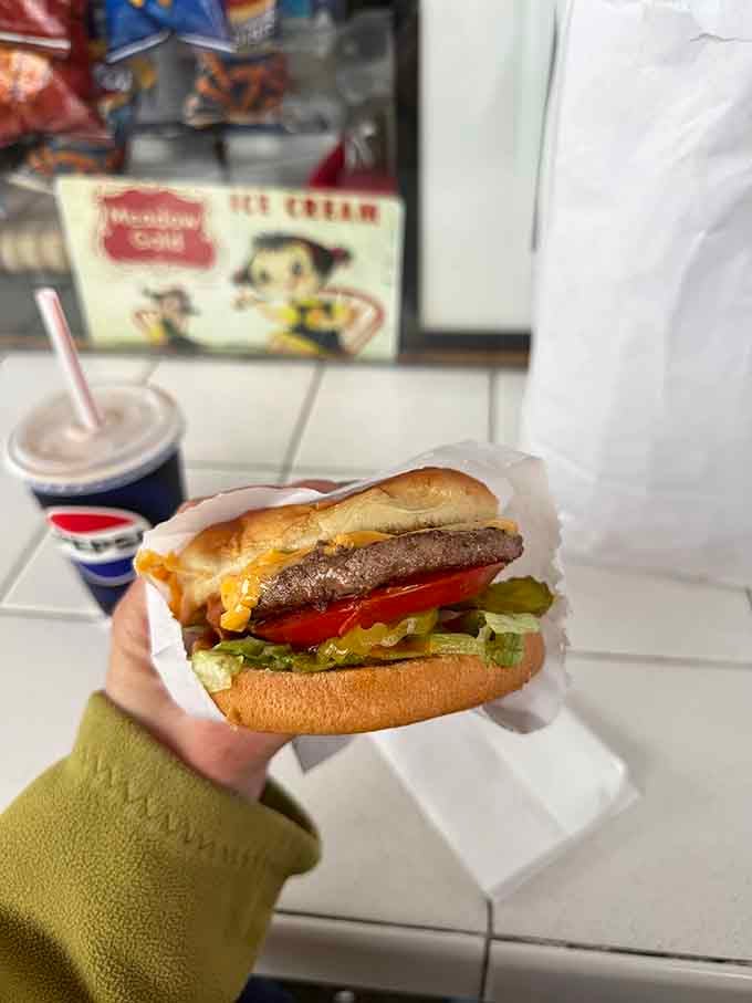 A cheeseburger that looks like it was assembled by someone who actually cares about your happiness and your hunger.