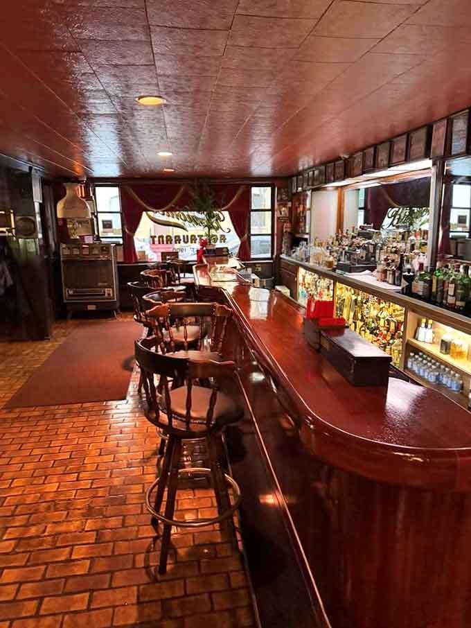 The bar area feels like a film set where Scorsese characters might gather, offering classic cocktails served with no pretension and plenty of history.