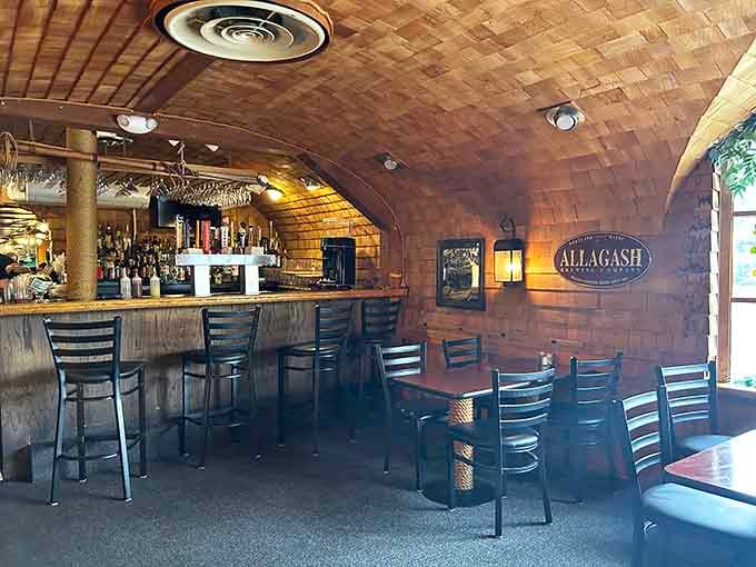 The bar area doesn't just serve drinks&mdash;it serves maritime history with a side of local banter. That curved ceiling makes you feel like you're in a ship's galley.