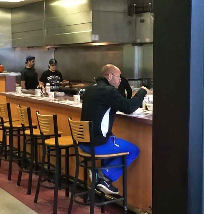 Counter seating offers front-row views of the kitchen magic, where breakfast dreams become delicious reality before your eyes.