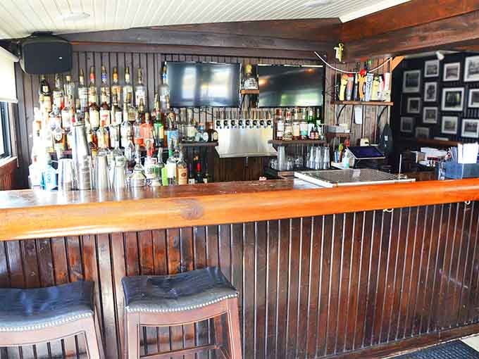 The bar area beckons with that classic tavern charm where good drinks and even better conversations have flowed freely.