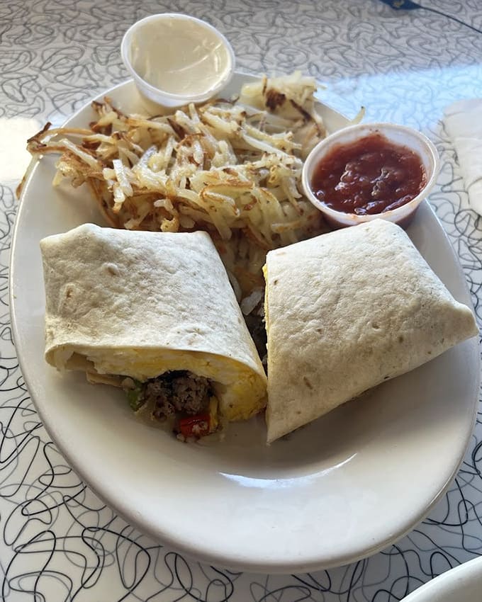 The Low Rider breakfast burrito arrives with crispy hash browns, proving handheld morning meals are severely underrated in America.