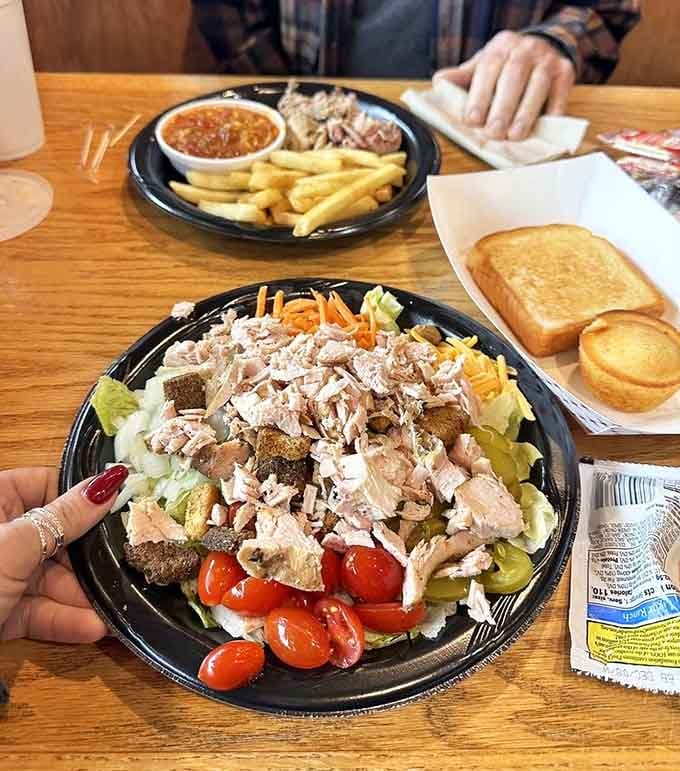 Even the salads here get the barbecue treatment, because vegetables deserve some smoky love too, apparently.