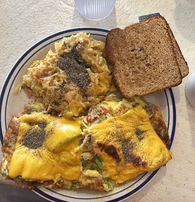 A cheese omelette paired with hash brown casserole is the kind of breakfast that fuels entire days.