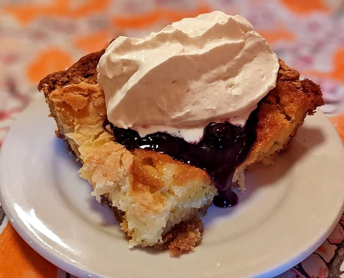Sugar cream pie with a mountain of whipped cream, because Indiana knows exactly how to end a meal properly.