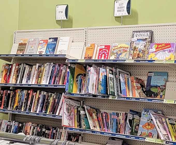 The book section—a library where every volume costs less than a coffee, and the only late fee is the regret of passing up a good find.