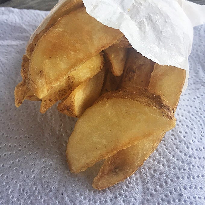 Golden potato wedges that prove sometimes the simplest sides are the most satisfying choices you'll make today.