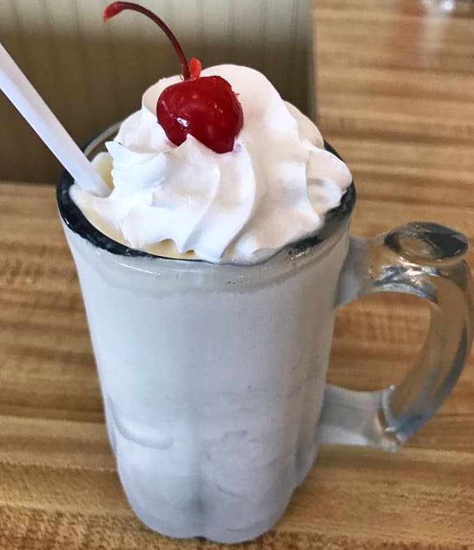 That vanilla malt with whipped cream and a cherry is basically a hug in a glass.