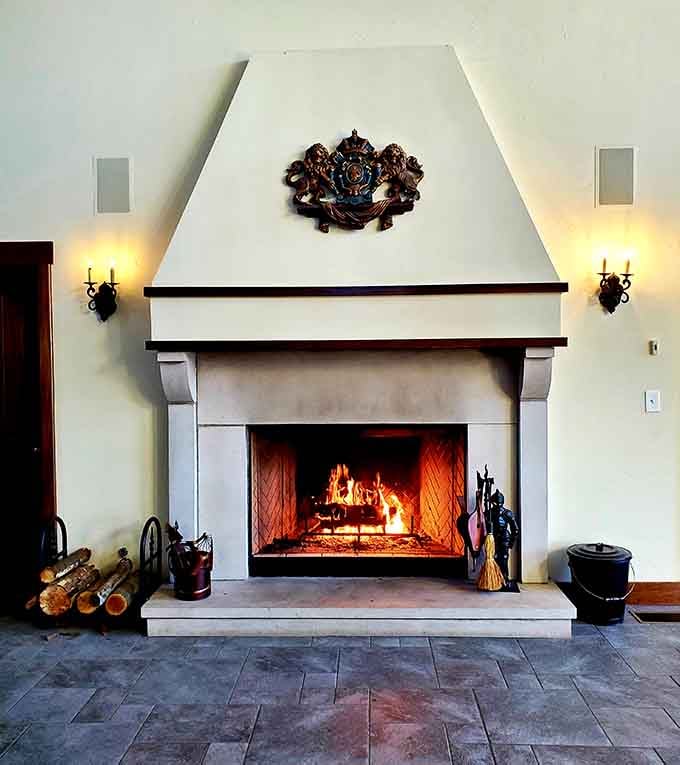 A roaring fireplace adds warmth and ambiance, perfect for plotting your next kingdom expansion or just relaxing.