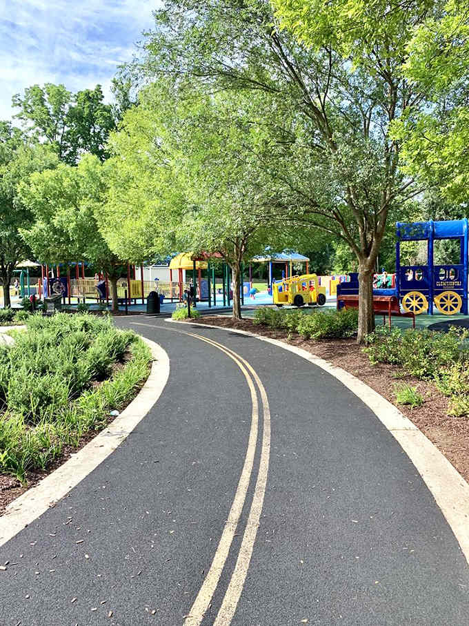 Paved pathways wind through the park, making every corner accessible for wheels, walkers, and wandering feet.