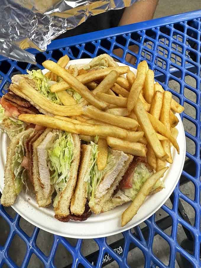 The club sandwich: three layers of bread creating the perfect architecture for a skyscraper of flavor. Engineering you can eat!