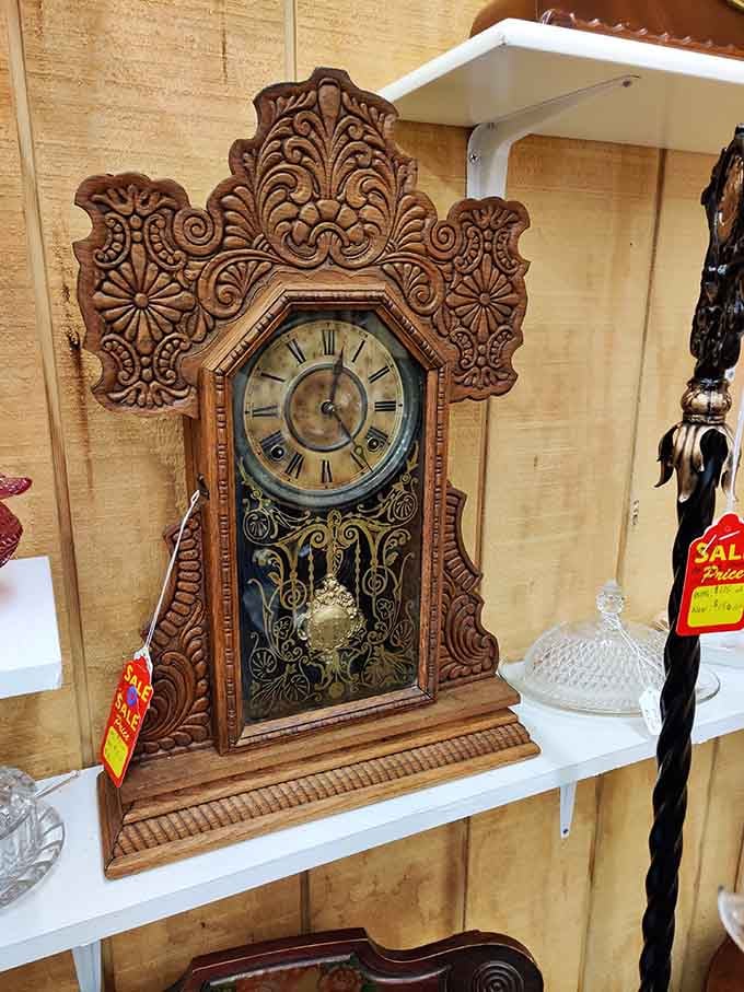 An ornately carved antique clock that's seen more time pass than your smartphone's battery could ever dream of lasting.