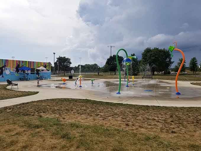 Splash pads provide summer fun that's completely free, unlike those overpriced water parks elsewhere charging admission.