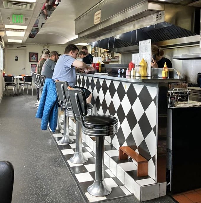 Where magic happens: Locals perch at the counter for front-row seats to the short-order cooking show.