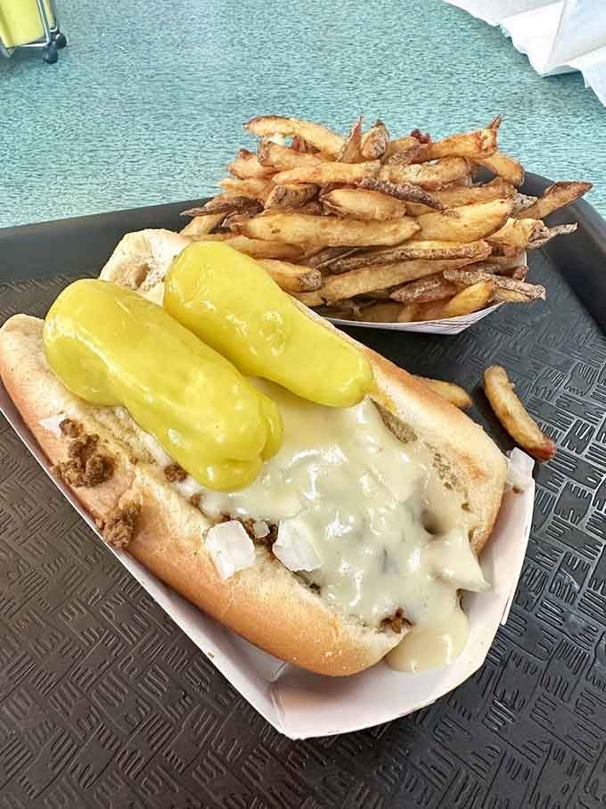 Cheese sauce cascading over a sandwich like this should probably be illegal, but thankfully it's not.