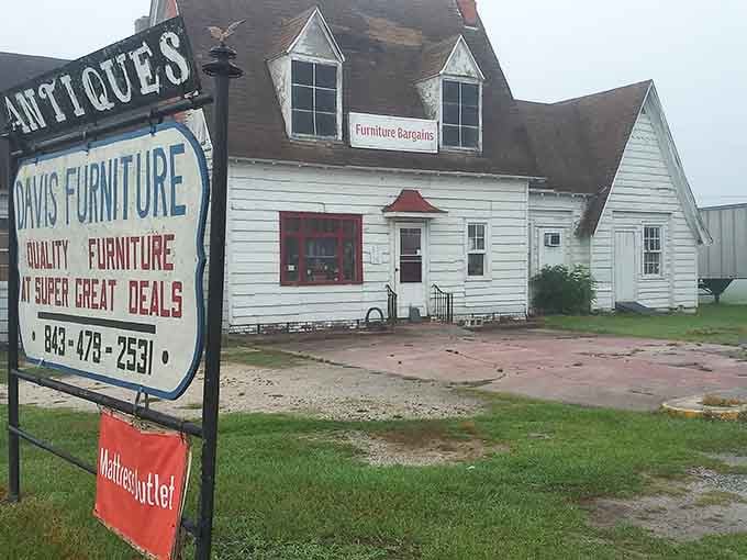 Davis Furniture's weathered sign and classic building promise bargains with history, where every chair has a story and every price a pleasant surprise.